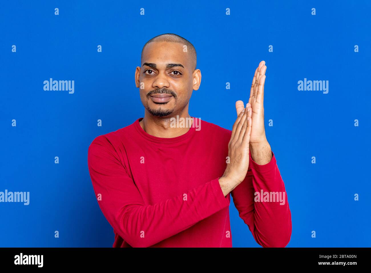 Young happy african man clapping hi-res stock photography and images ...