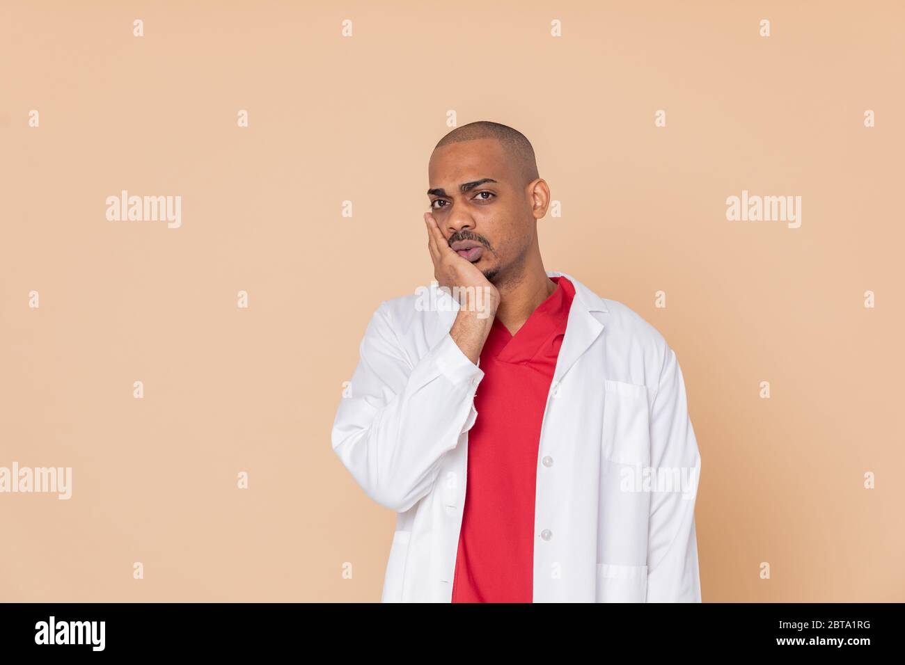 Worried doctor thinking gesture hi-res stock photography and images - Alamy