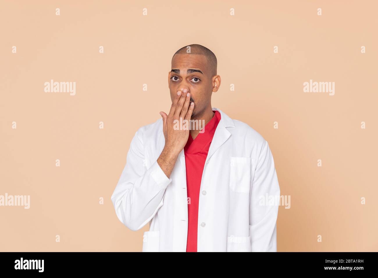 Black man lab coat thinking hi-res stock photography and images - Alamy