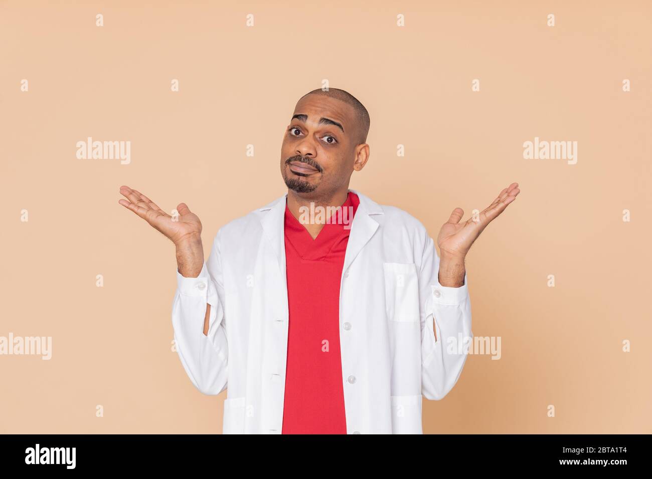 Black man lab coat thinking hi-res stock photography and images - Alamy