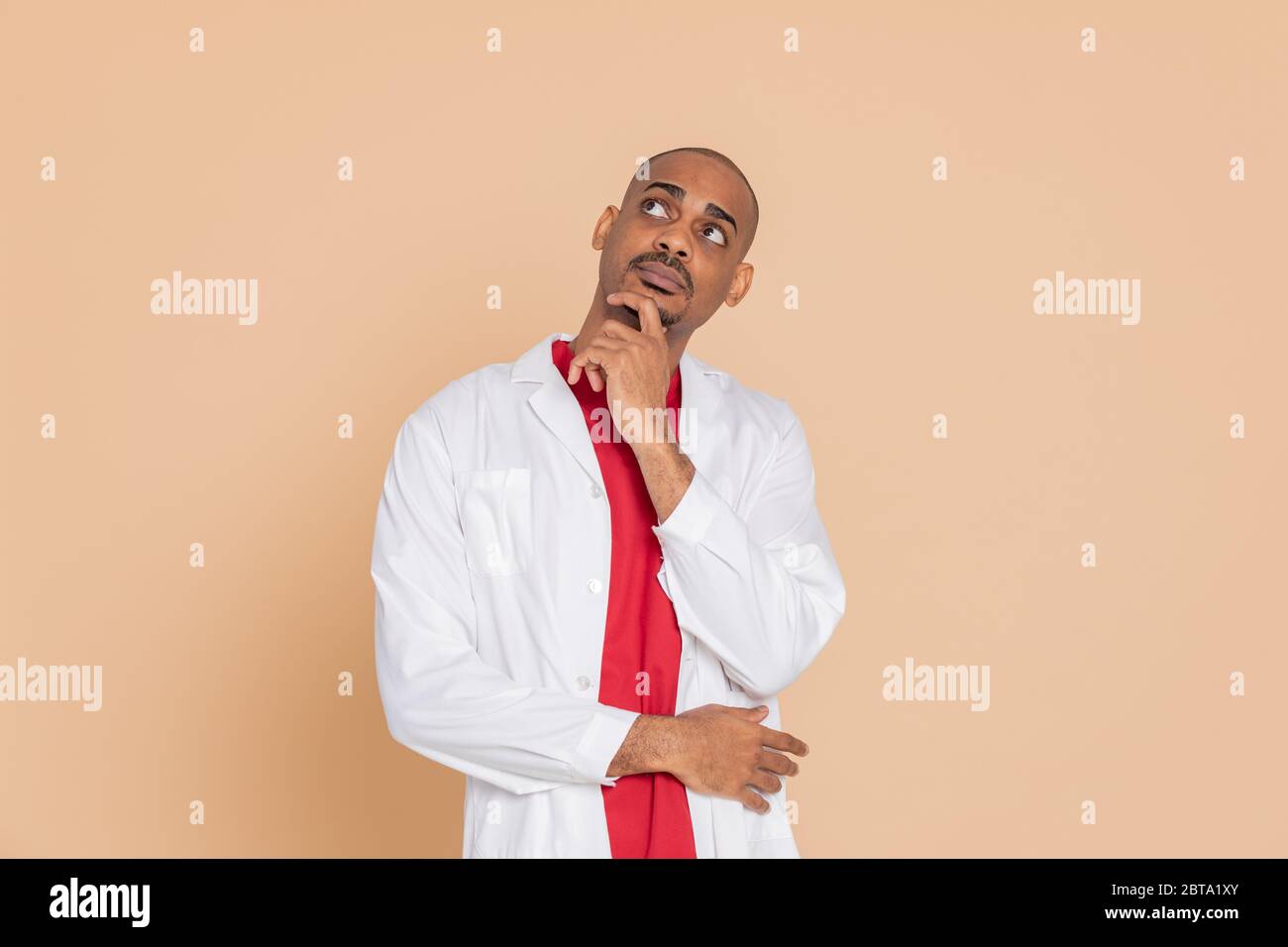 African lab coat thinking hi-res stock photography and images - Alamy