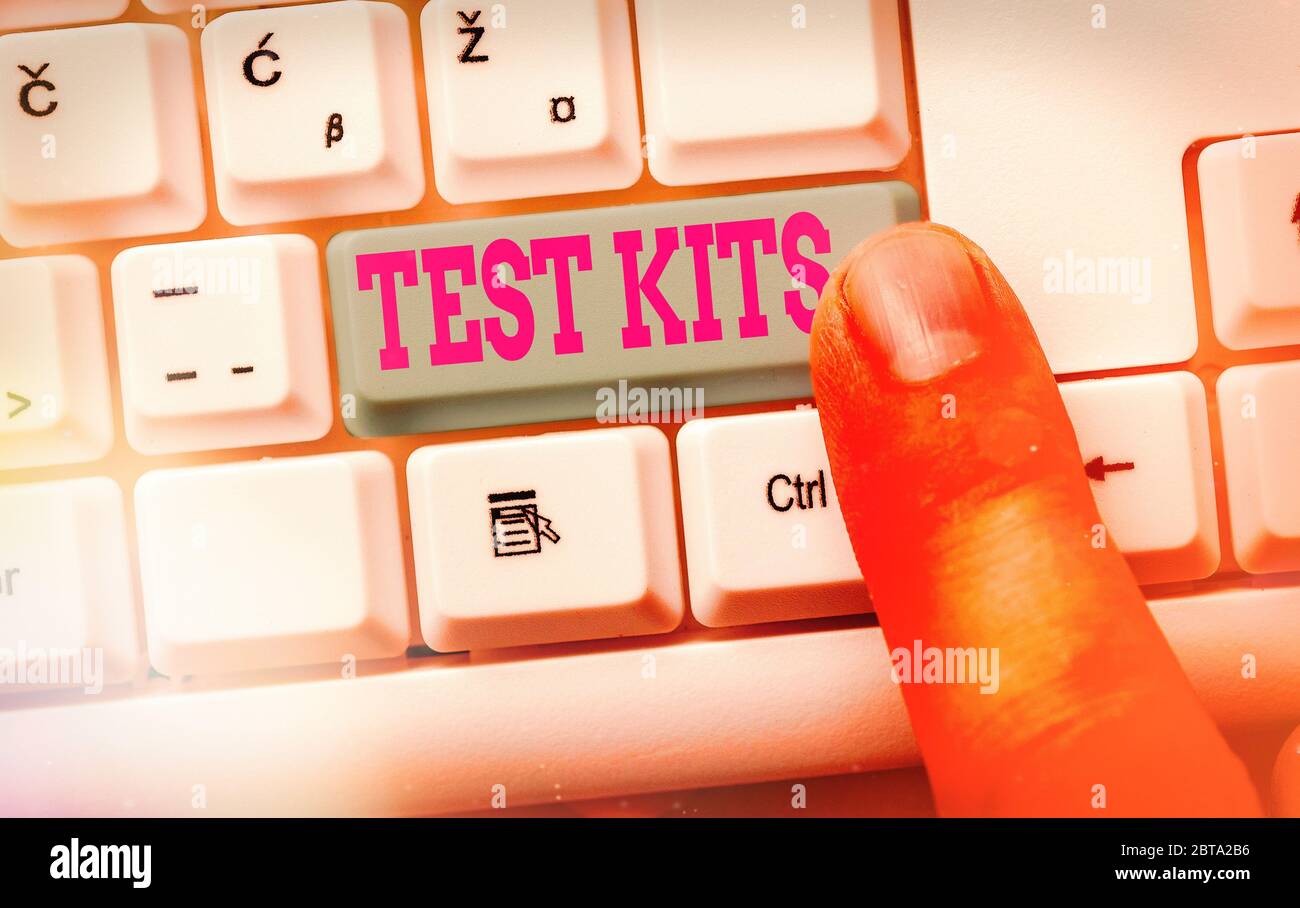 Writing note showing Test Kits. Business concept for tools used to ...