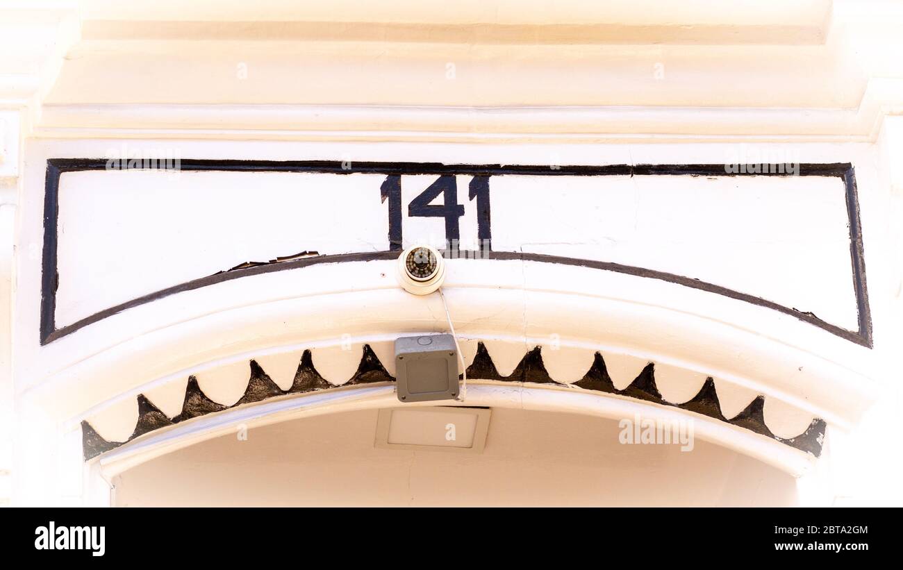 House number 141 with camera Stock Photo - Alamy