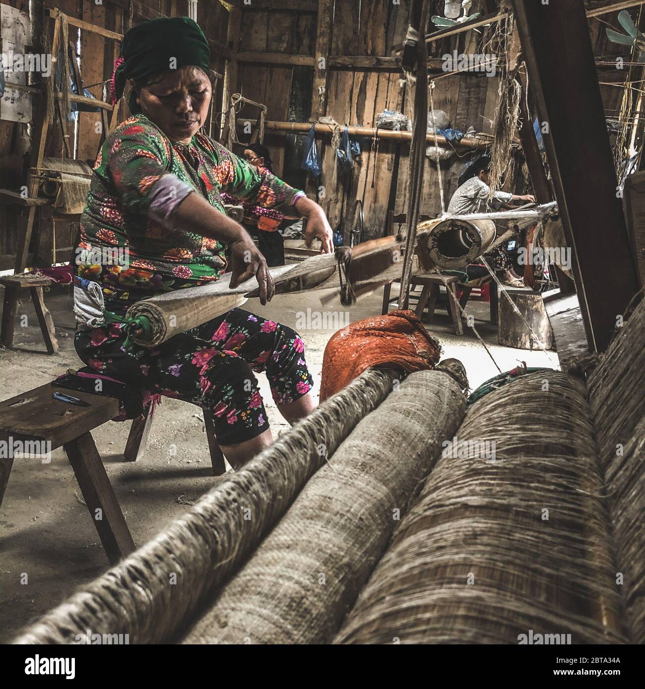 Lung Tam, Vietnam - January 9, 2020 - Woman weaving in a traditional ...