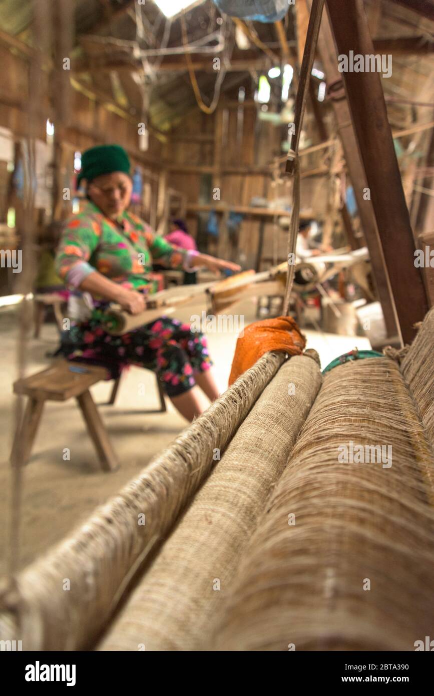 Lung Tam, Vietnam - January 9, 2020 - Woman weaving in a traditional ...