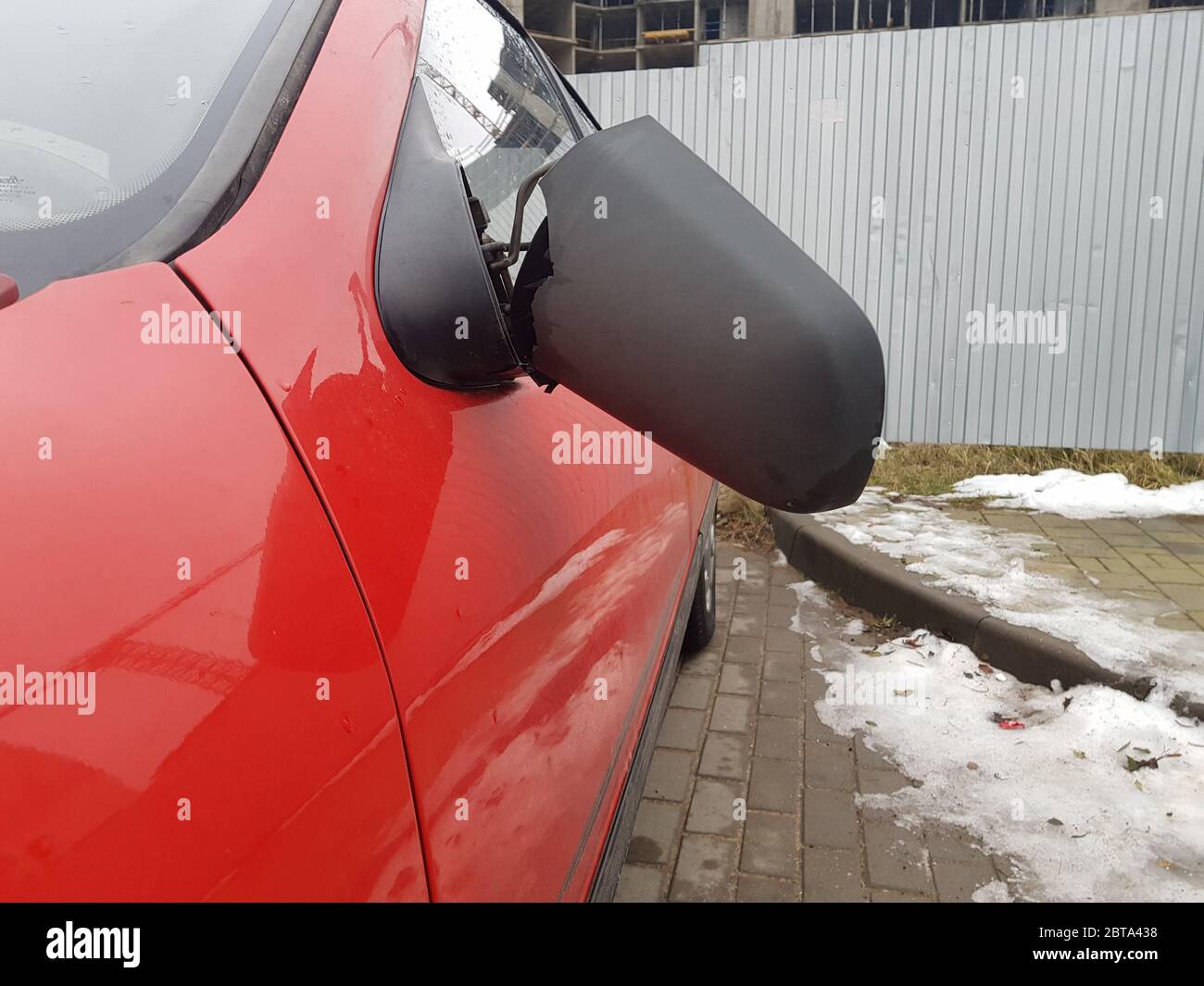 Cars mirror is broken, car accident in parking Stock Photo - Alamy