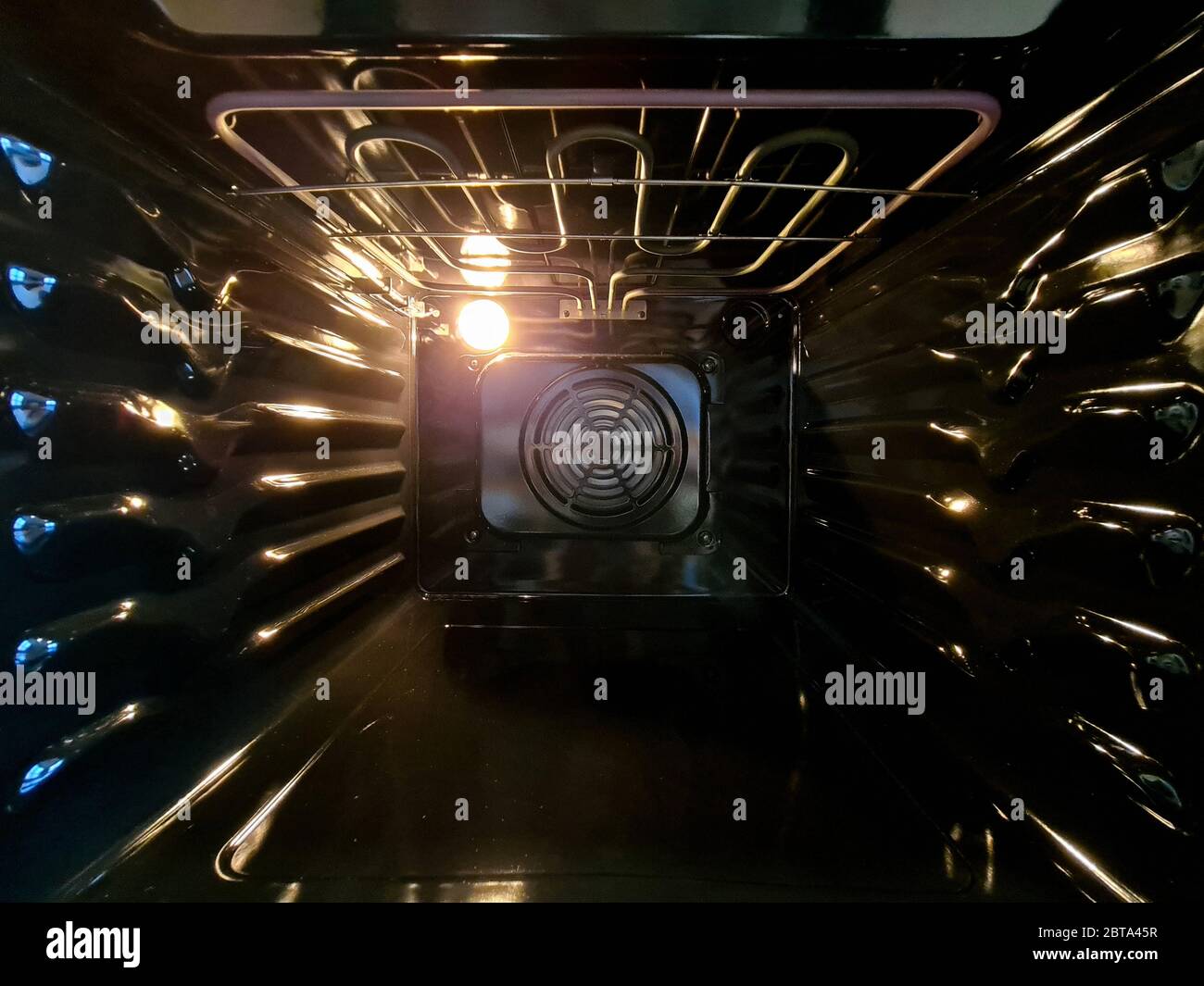 Kitchen inside view oven, microwave with grill Stock Photo - Alamy