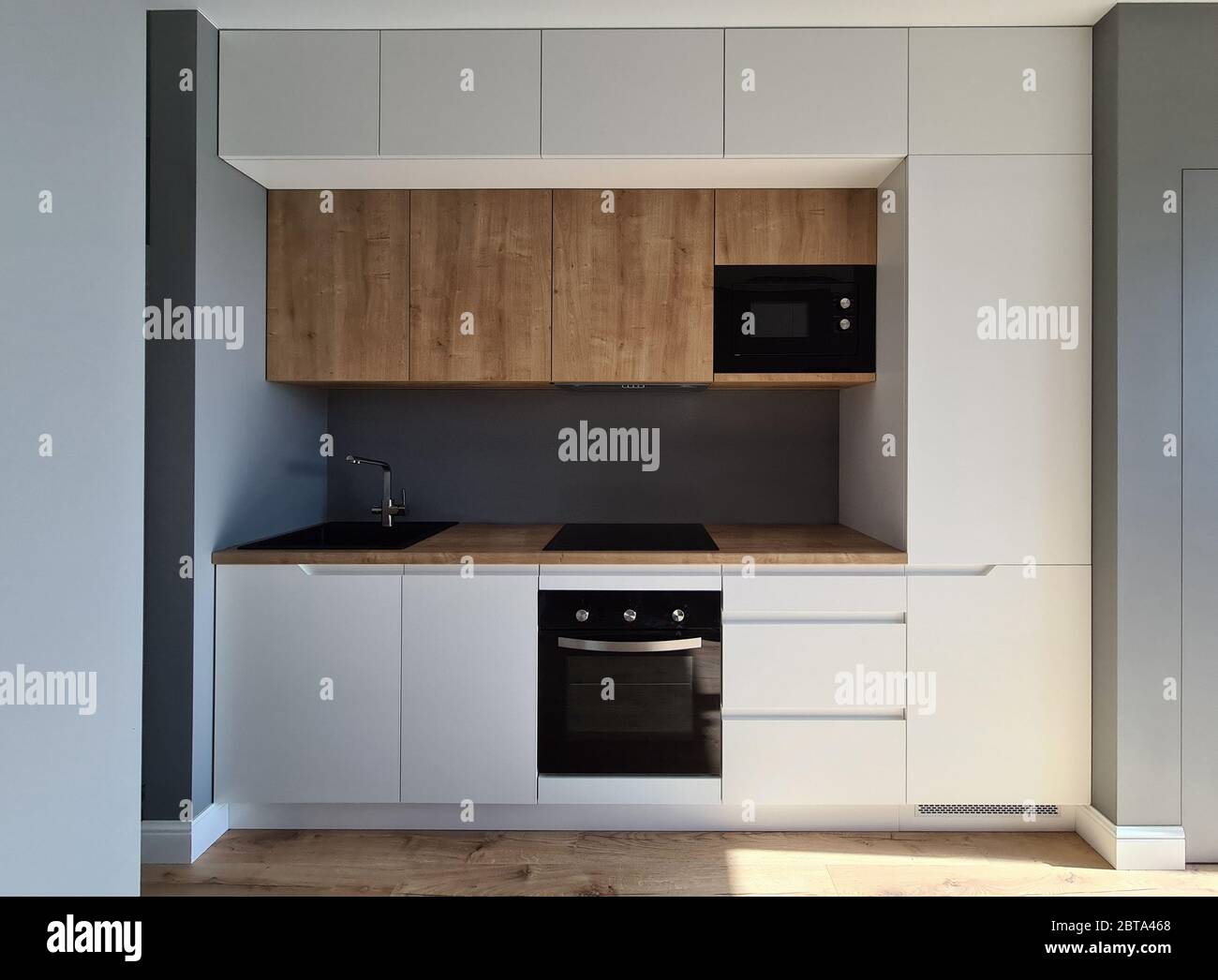 Installation built-in furniture and wiring kitchen Stock Photo - Alamy
