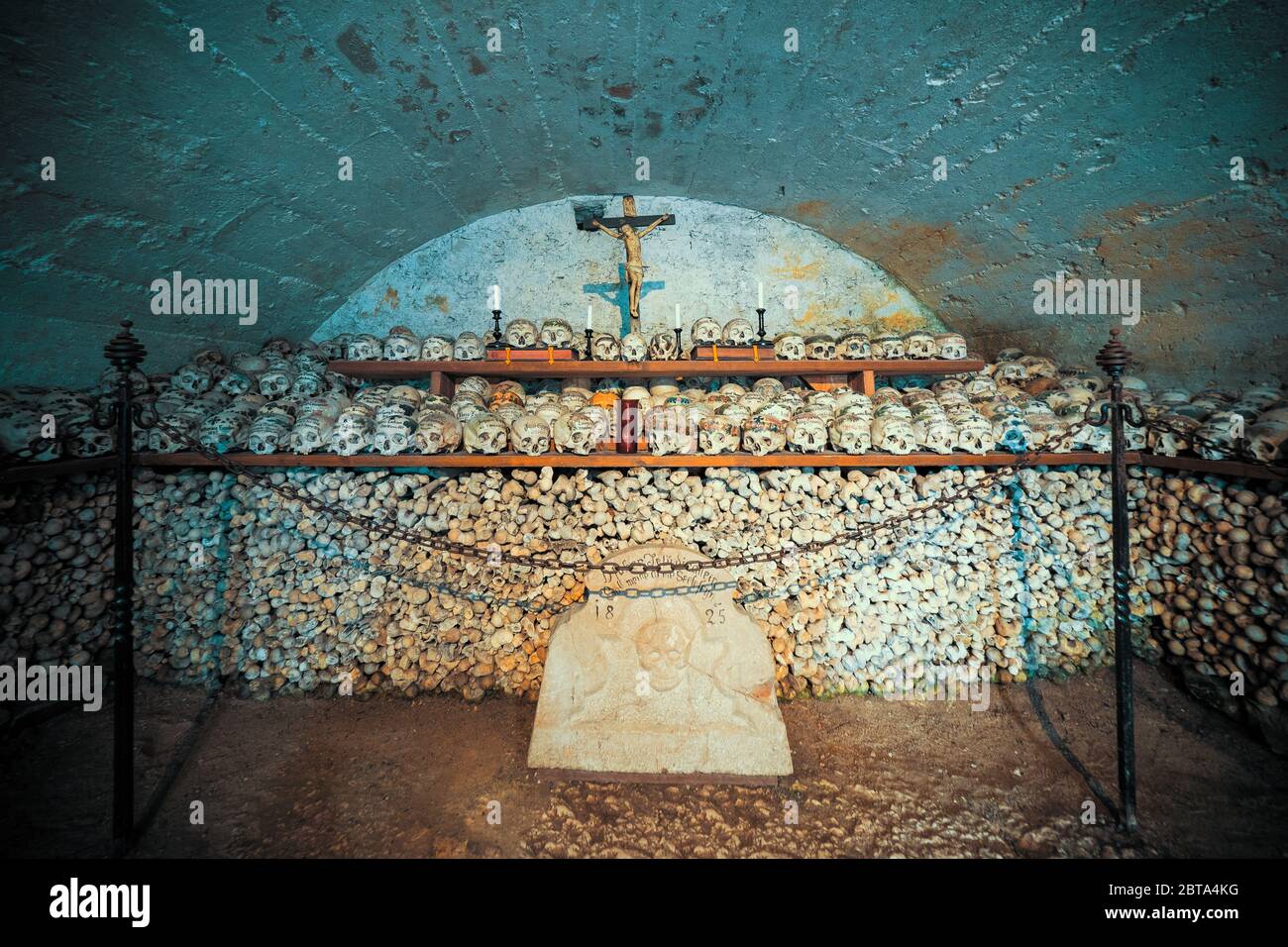 View of hundreds of painted skulls and bones inside the famous charnel ...