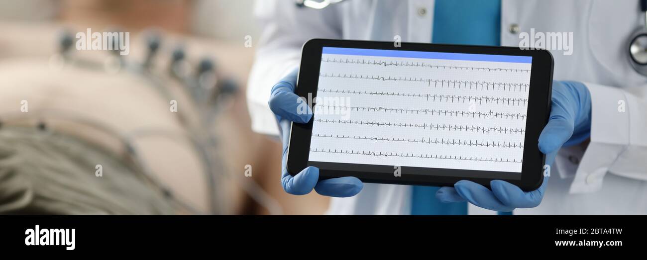 Examination and diagnosis heart, cardiogram Stock Photo - Alamy