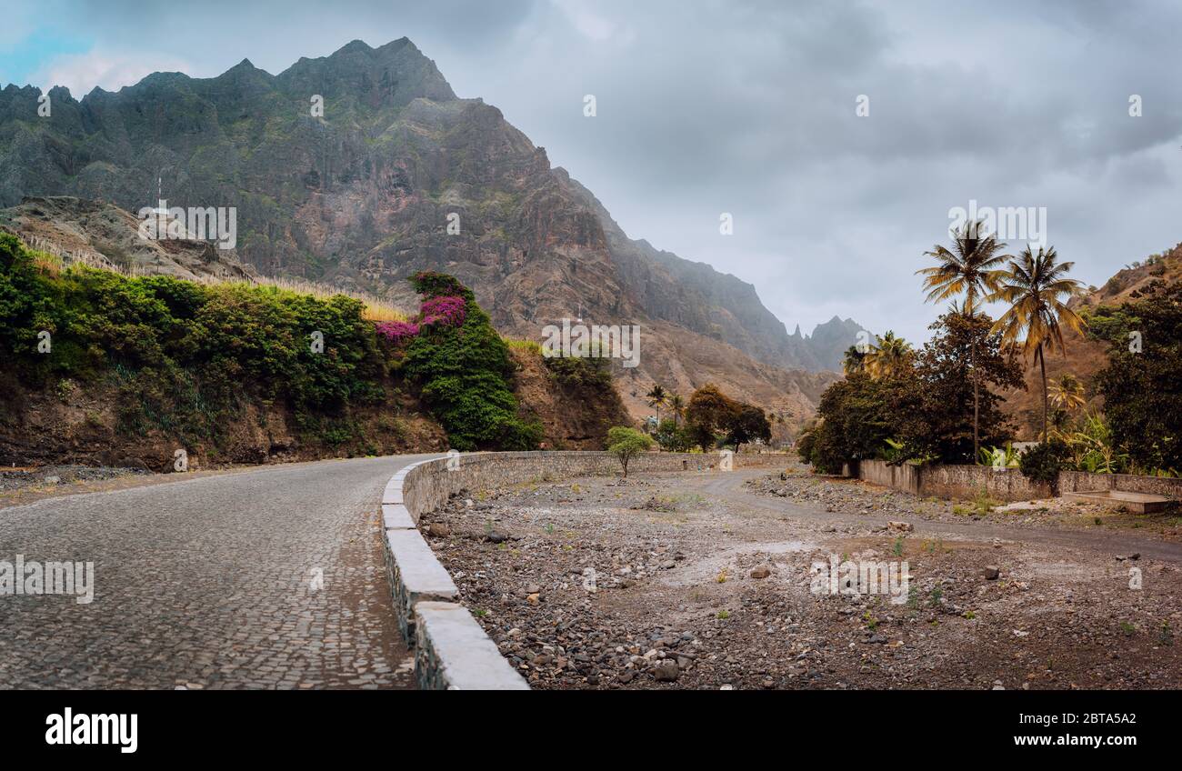 Rural landscape with road surrounded by arid mountains in the Coculi ...