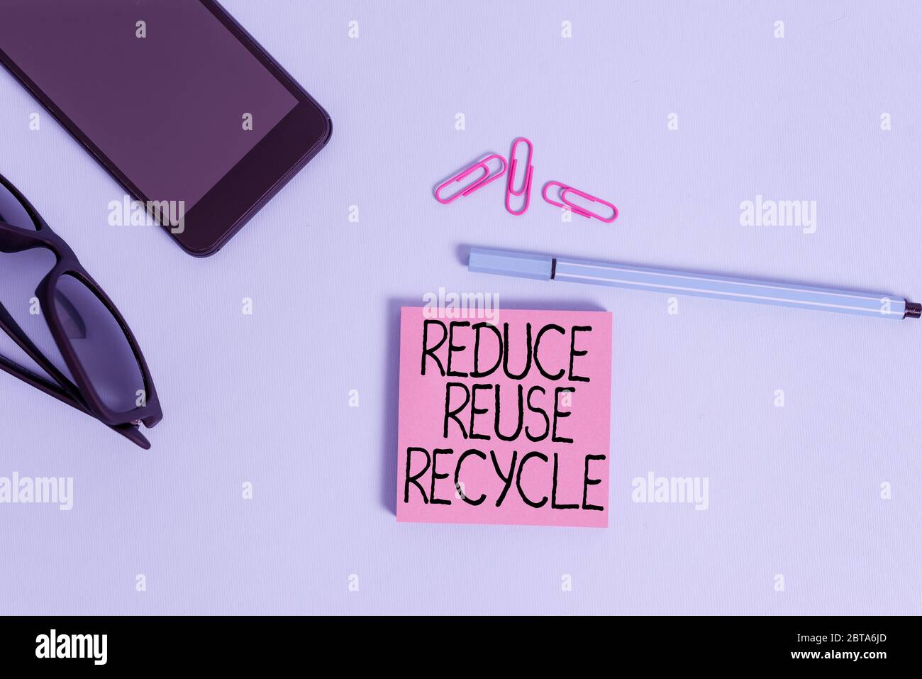 Writing note showing Reduce Reuse Recycle. Business concept for ...