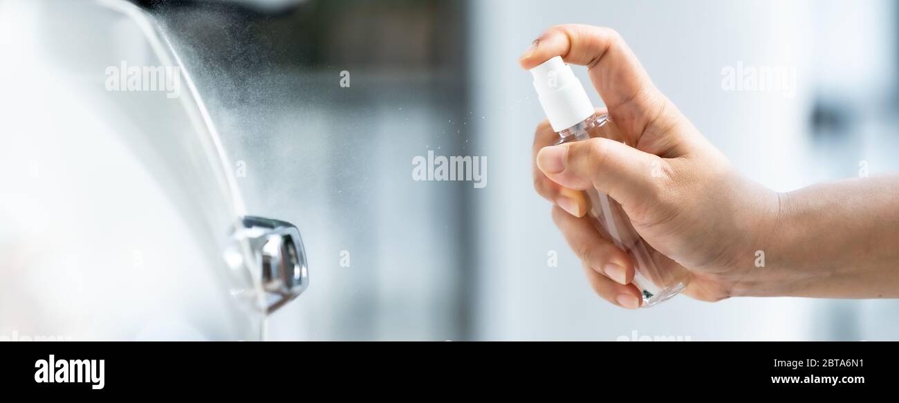 panoramic of car vehicle sterilization cleaning using hand spraying ...