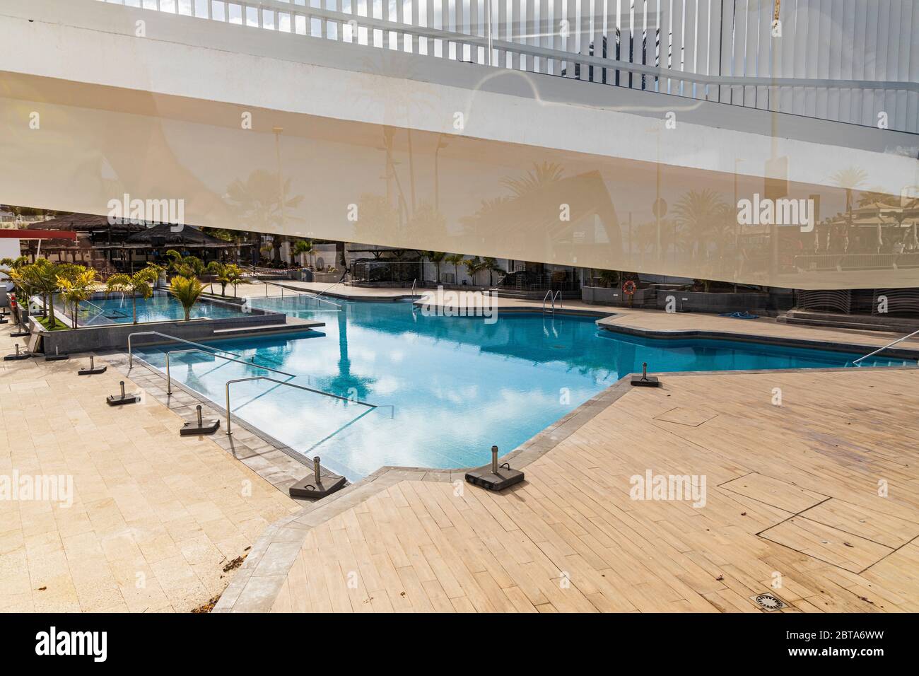 Deserted swimming pool at Hotel Troya during phase one of de-escalation ...