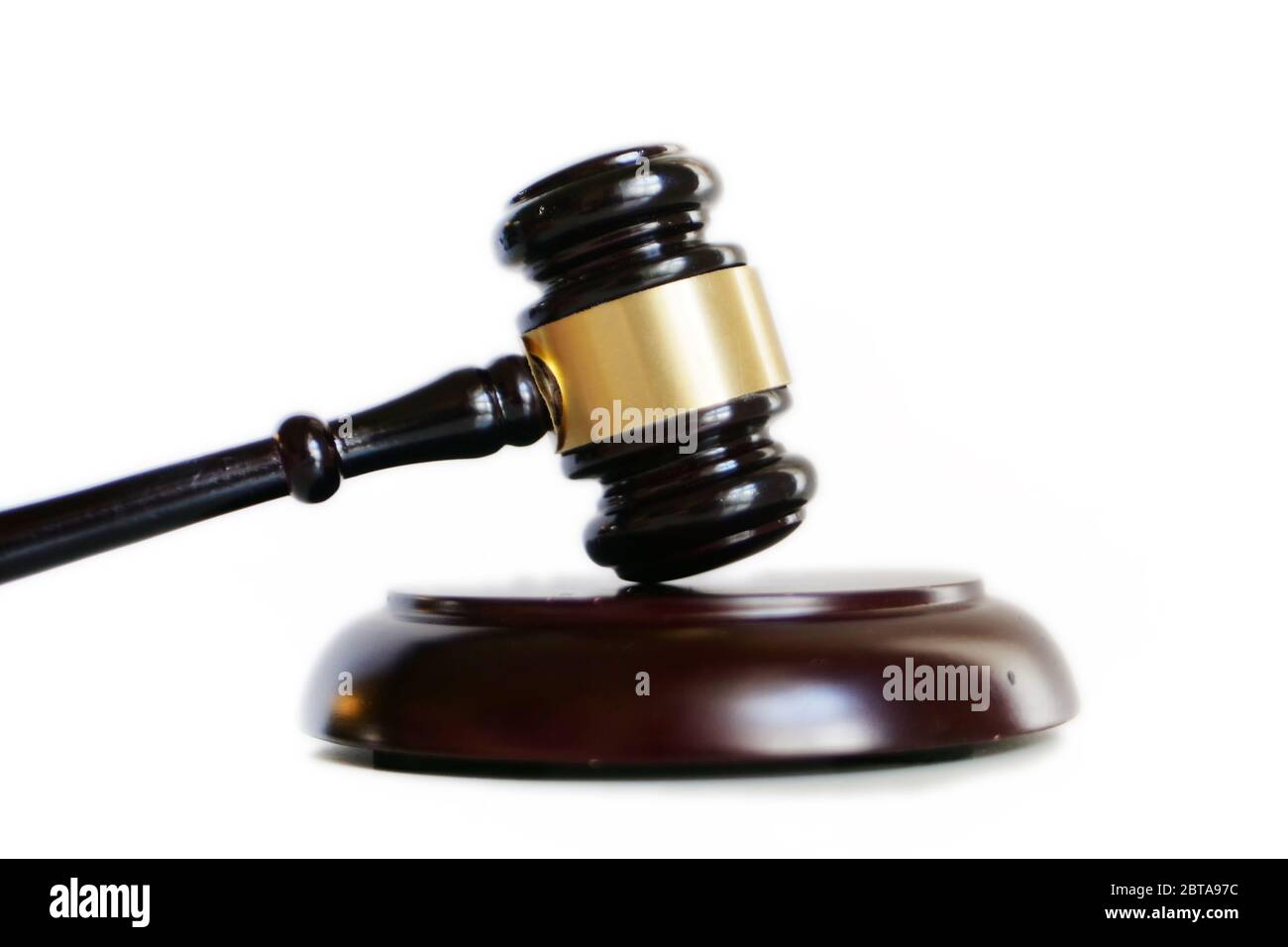 Court gavel used by judge lay on white surface side view Stock Photo ...