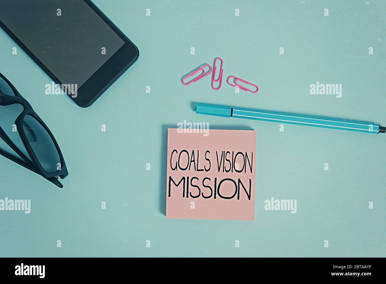 Writing note showing Goals Vision Mission. Business concept for ...