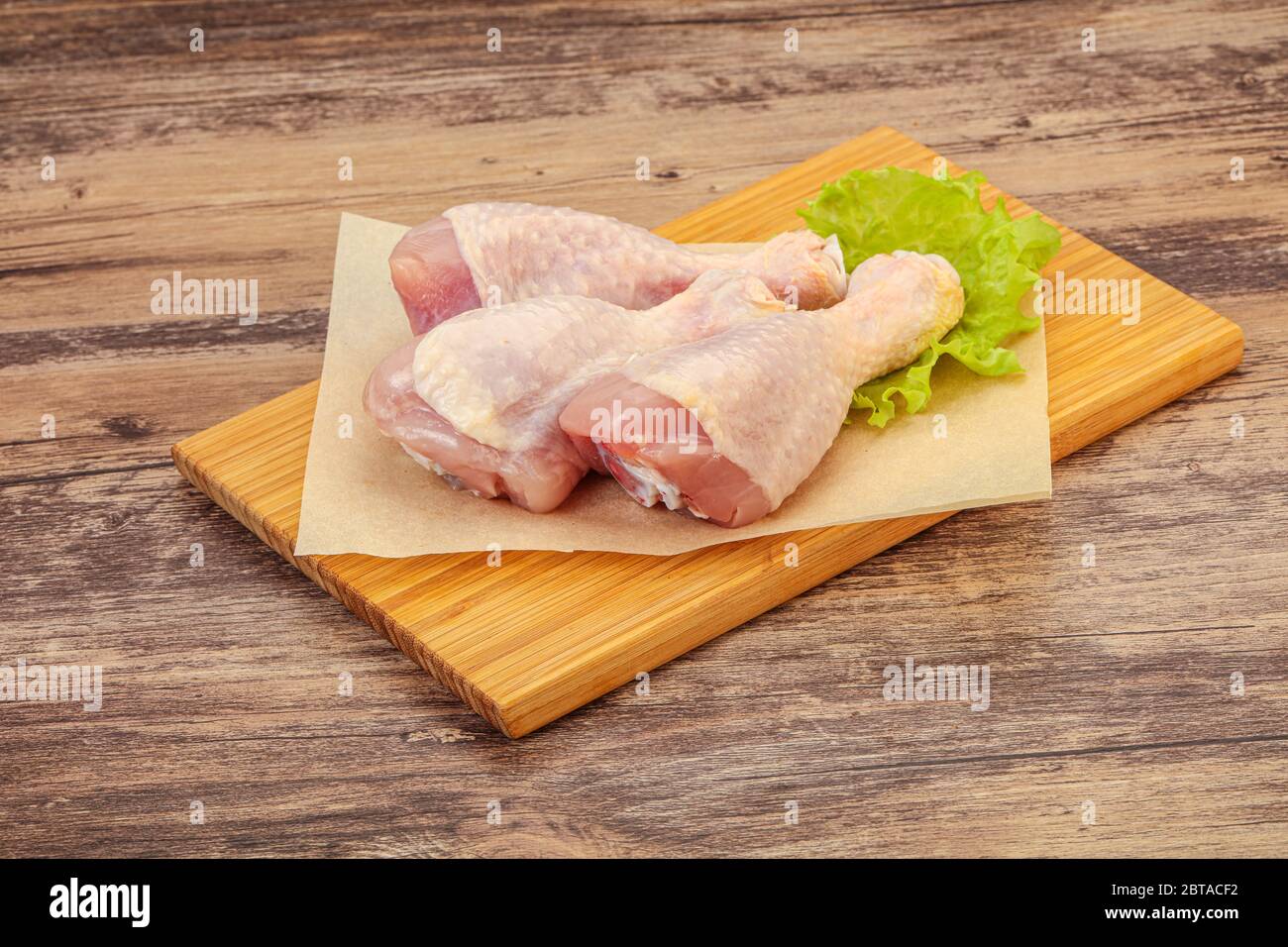 Raw chicken drumsticks ready for cooking Stock Photo - Alamy