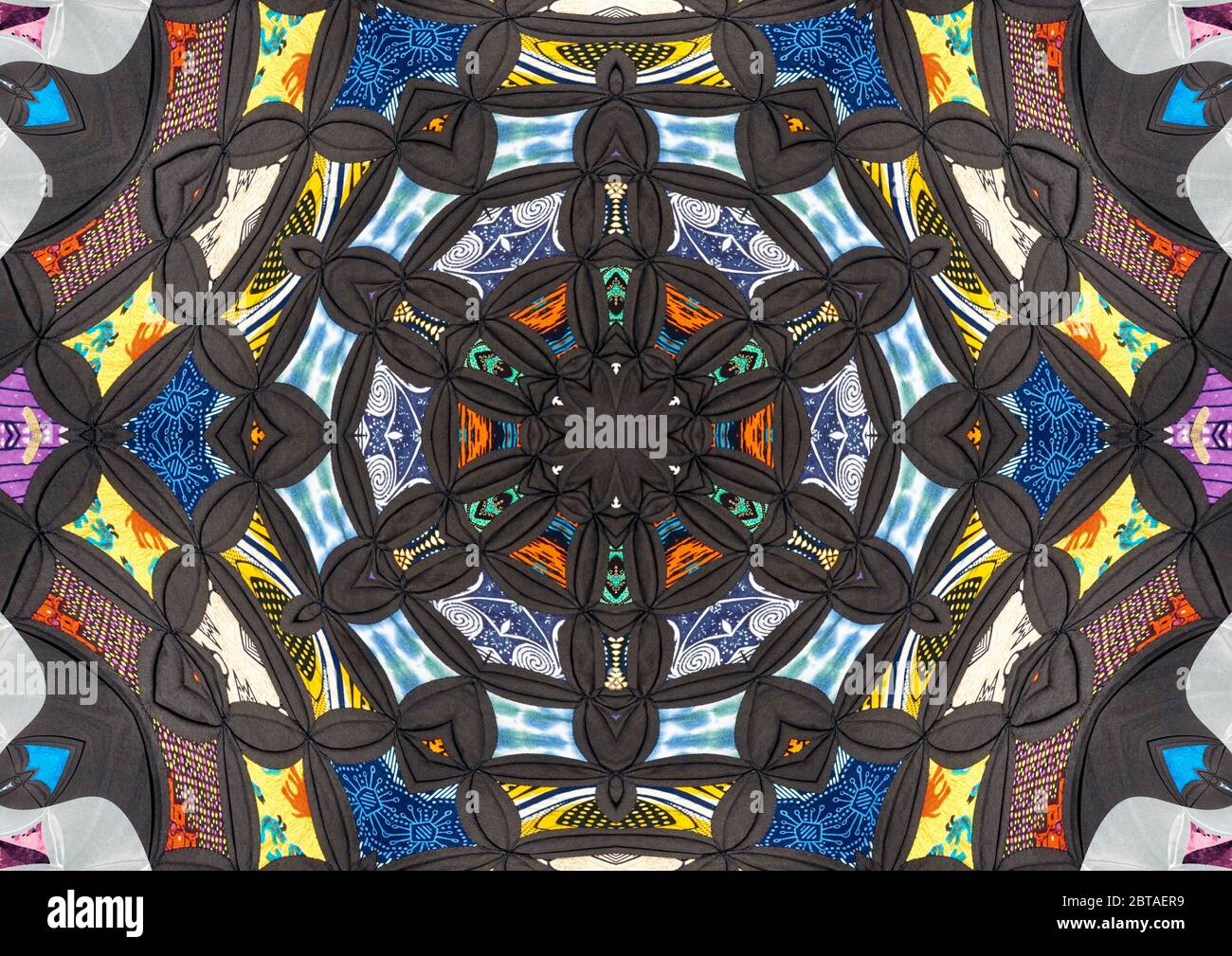 Mandalas inspired by the Cathedral Window Quilt by Viola Canady held by ...