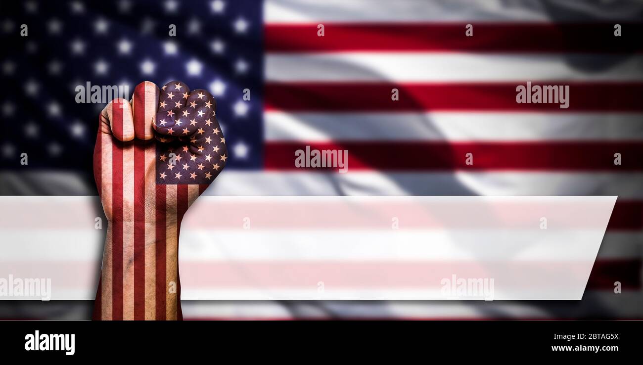 Banner of Flag of Unites States of America painted on male fist, fist ...