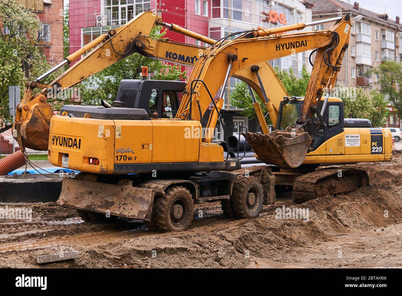 Perm, Russia - May 22. 2020: wheeled and crawler excavators during the ...
