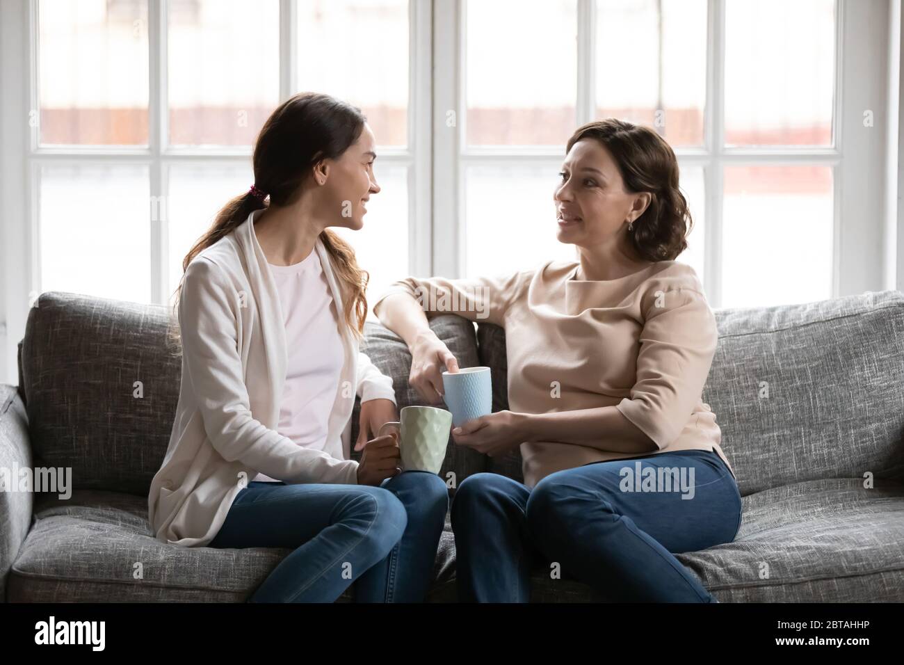 Middle aged daughter elderly tea hi-res stock photography and images ...