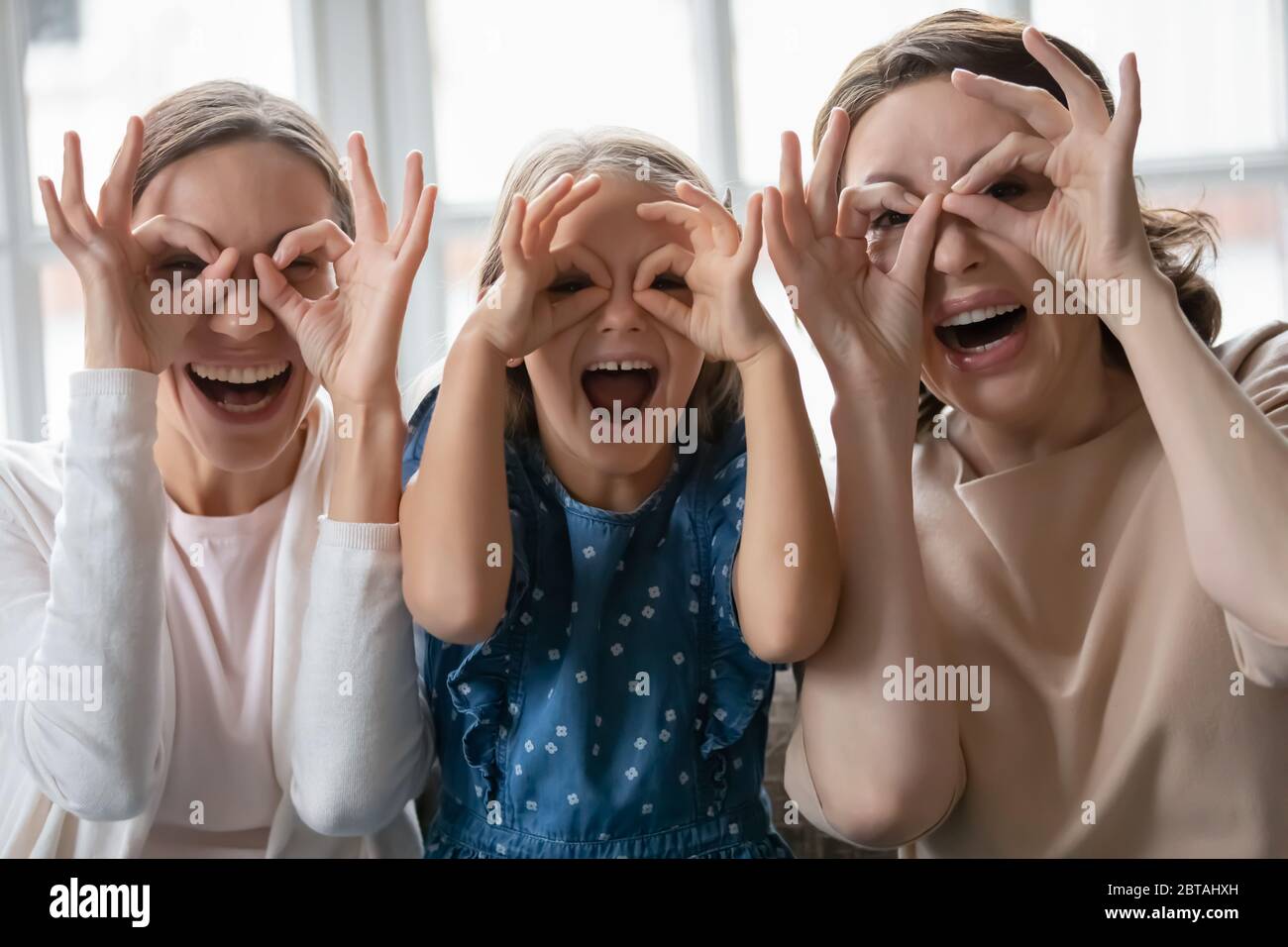 Portrait of happy three generations of women having fun Stock Photo - Alamy