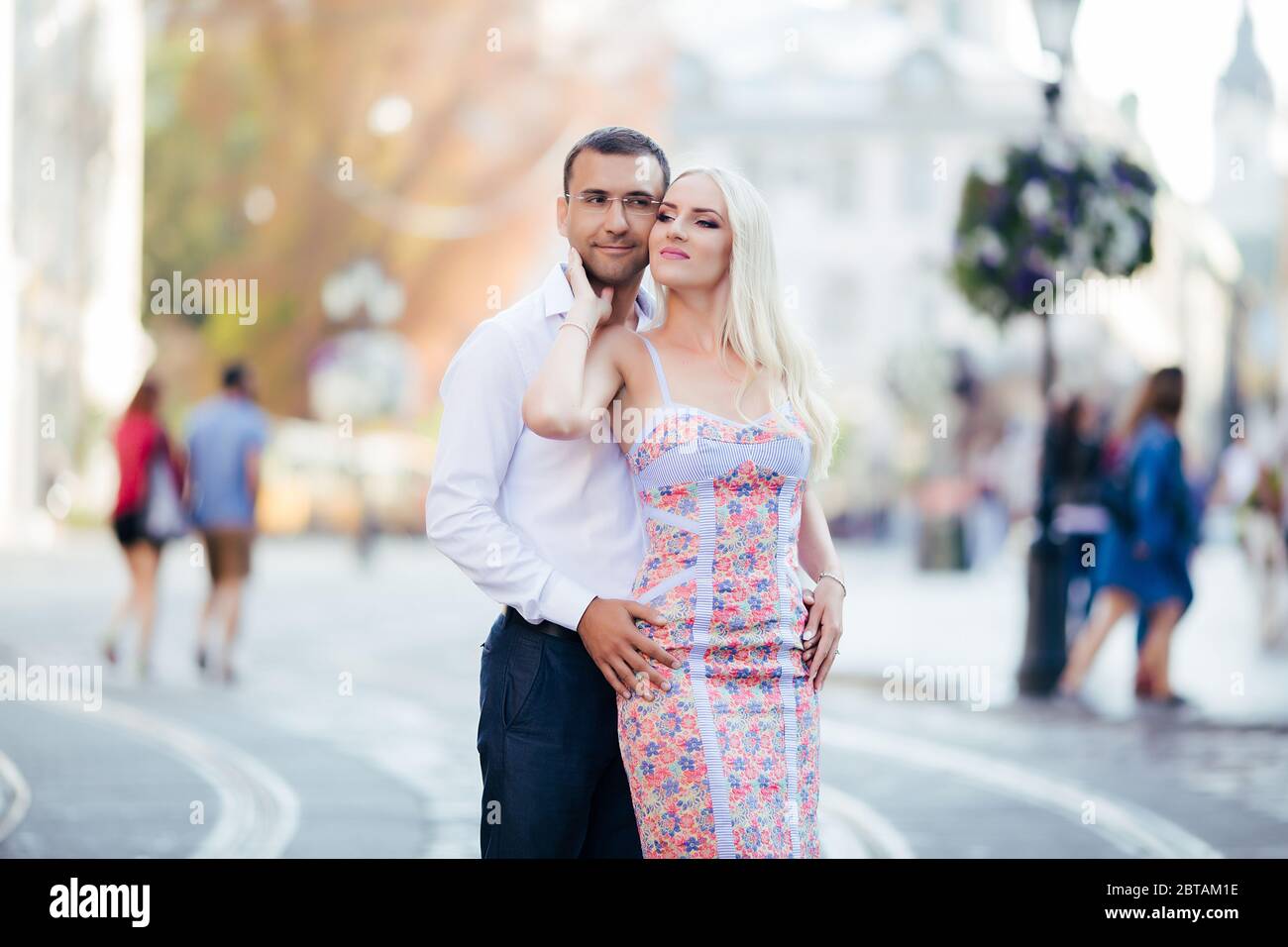 Romantic tourist couple walking around the city relaxing Stock Photo ...
