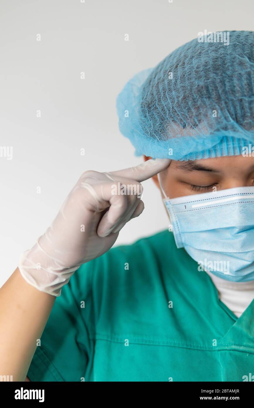 Male doctor praying workplace hi-res stock photography and images - Alamy