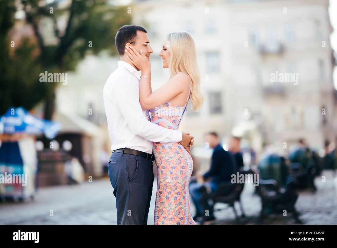 Romantic tourist couple walking around the city relaxing Stock Photo ...