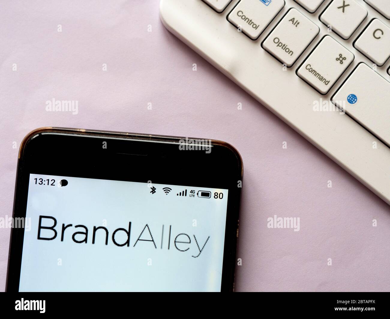 In this photo illustration a Brand Alley logo seen displayed on a ...
