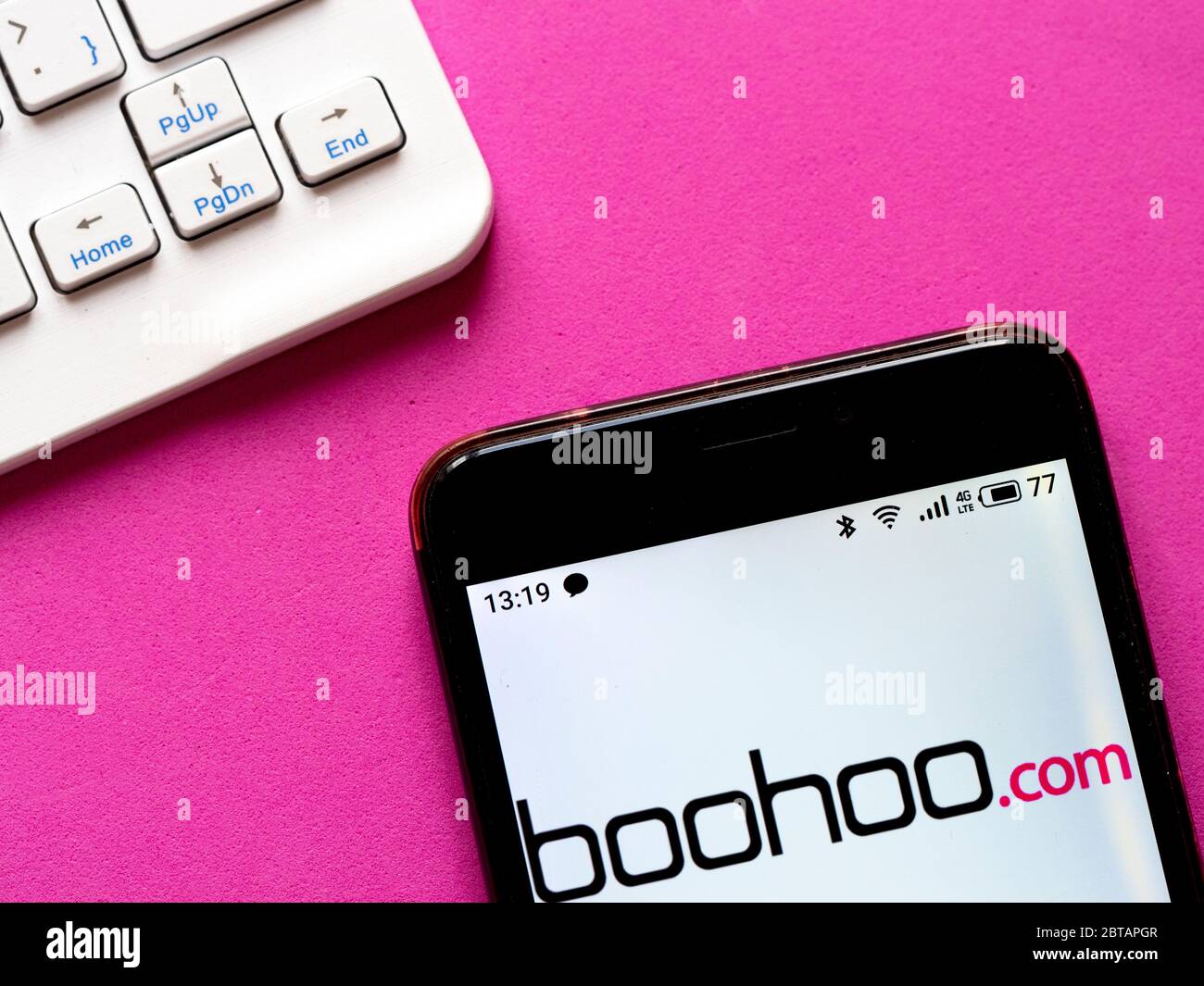 In this photo illustration a Boohoo logo seen displayed on a smartphone ...