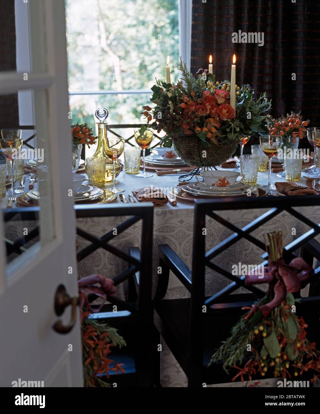 Dining table and chairs decorated for a birthday lunch Stock Photo - Alamy