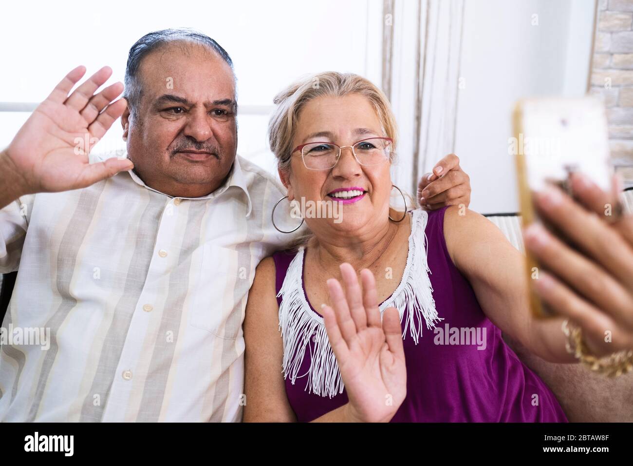 Old man woman calling relatives hi-res stock photography and images - Alamy