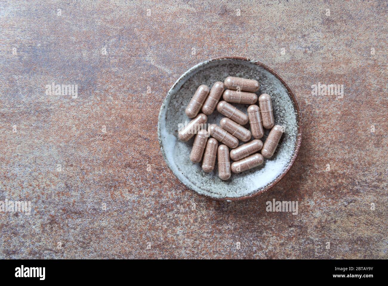 Schisandra chinensis. Herbal capsules with healthy medical plant ...
