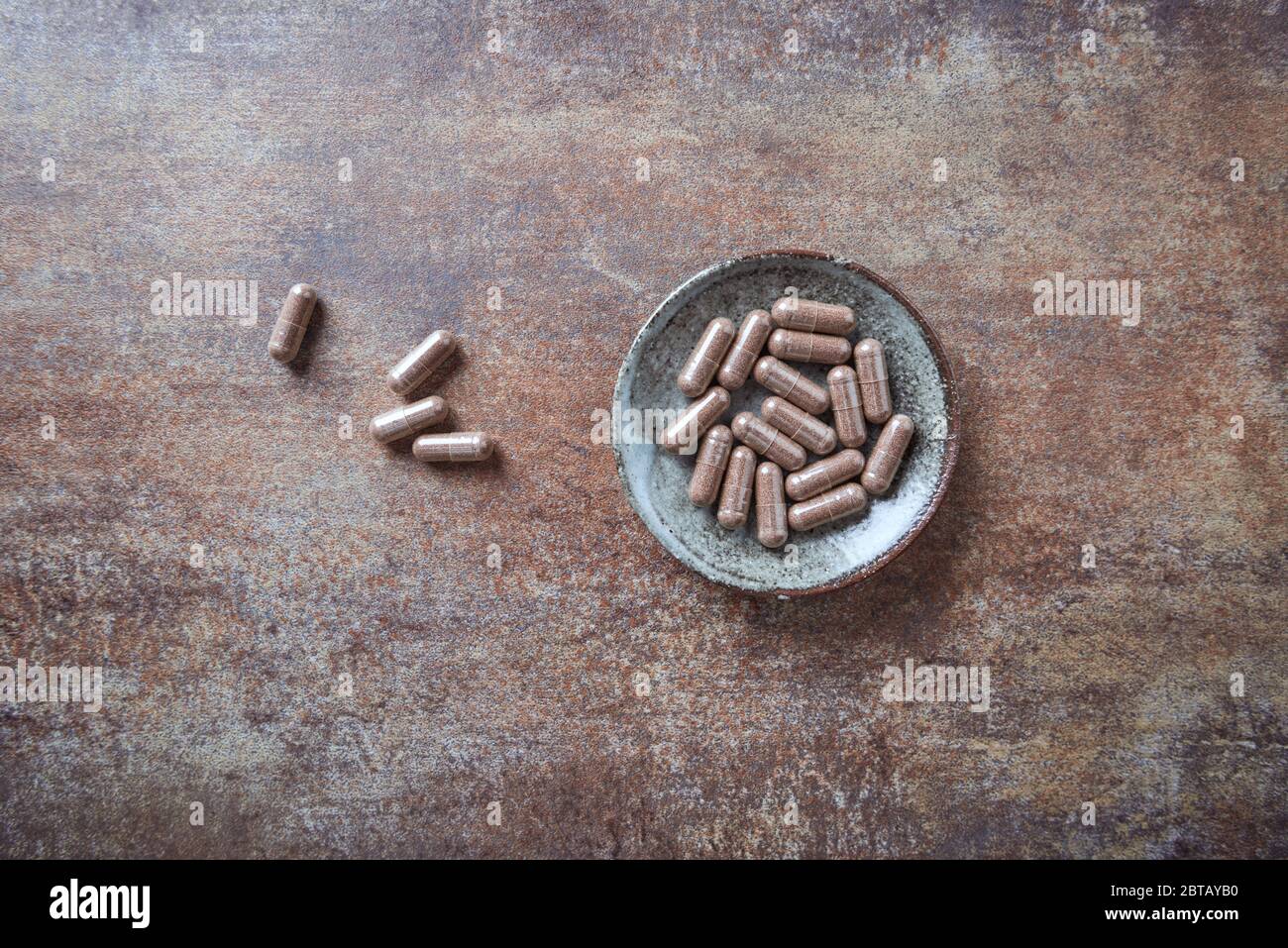 Schisandra chinensis. Herbal capsules with healthy medical plant ...