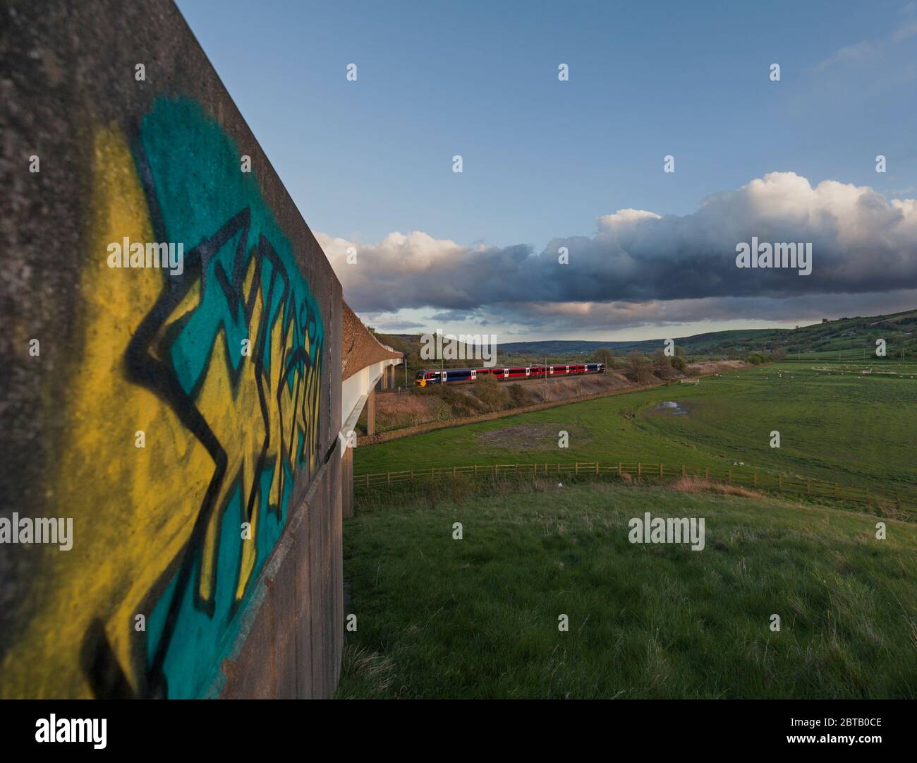Northern Rail Siemens class 333 electric train passing beneath a ...