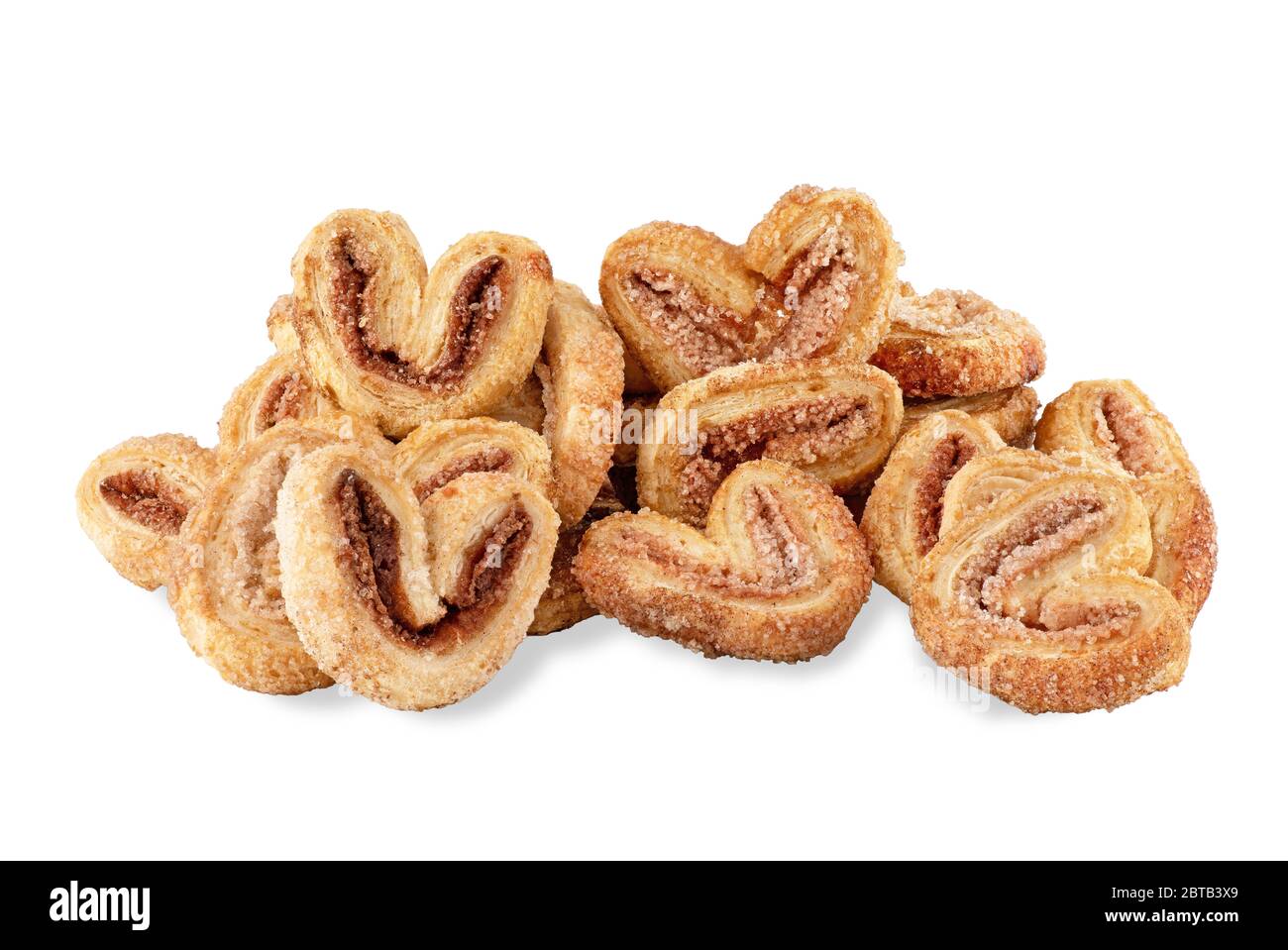 Palmier cookies with cinnamon from puff pastry ears isolated on a white ...