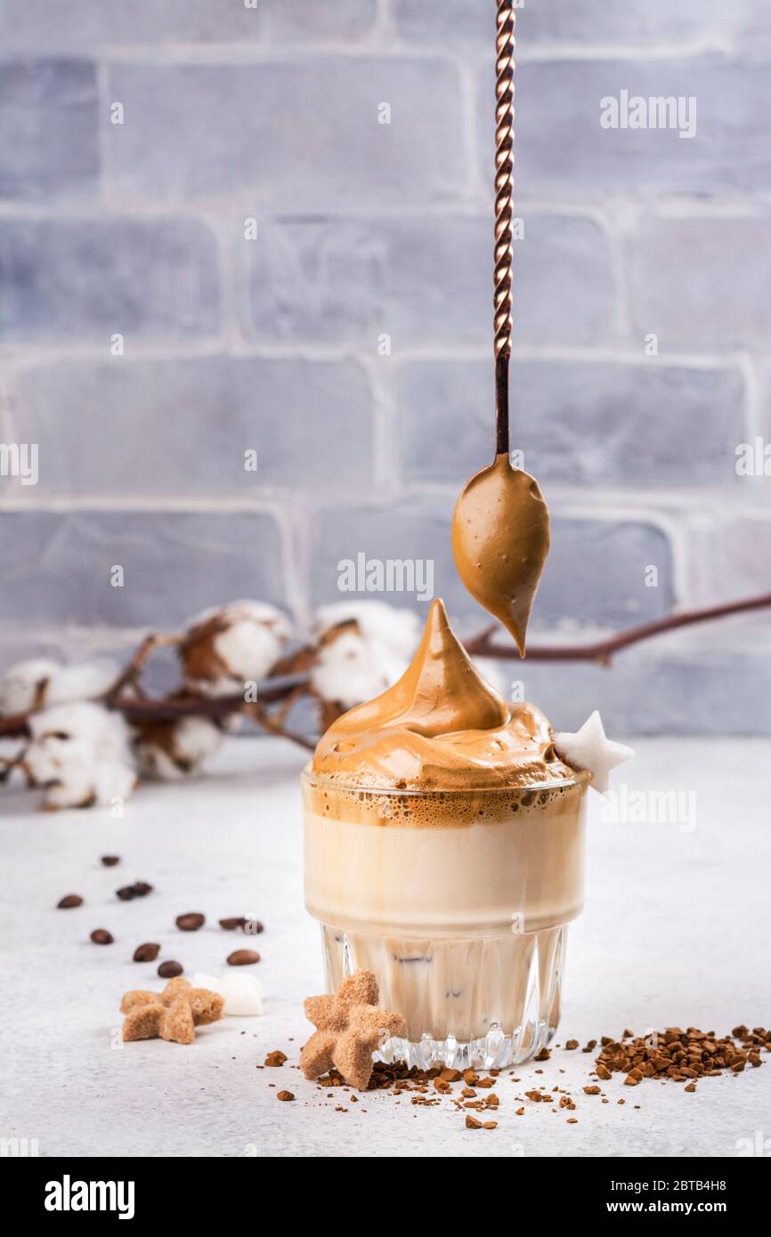 Dalgona korean coffee, trendy drink with whipped instant coffee and ...