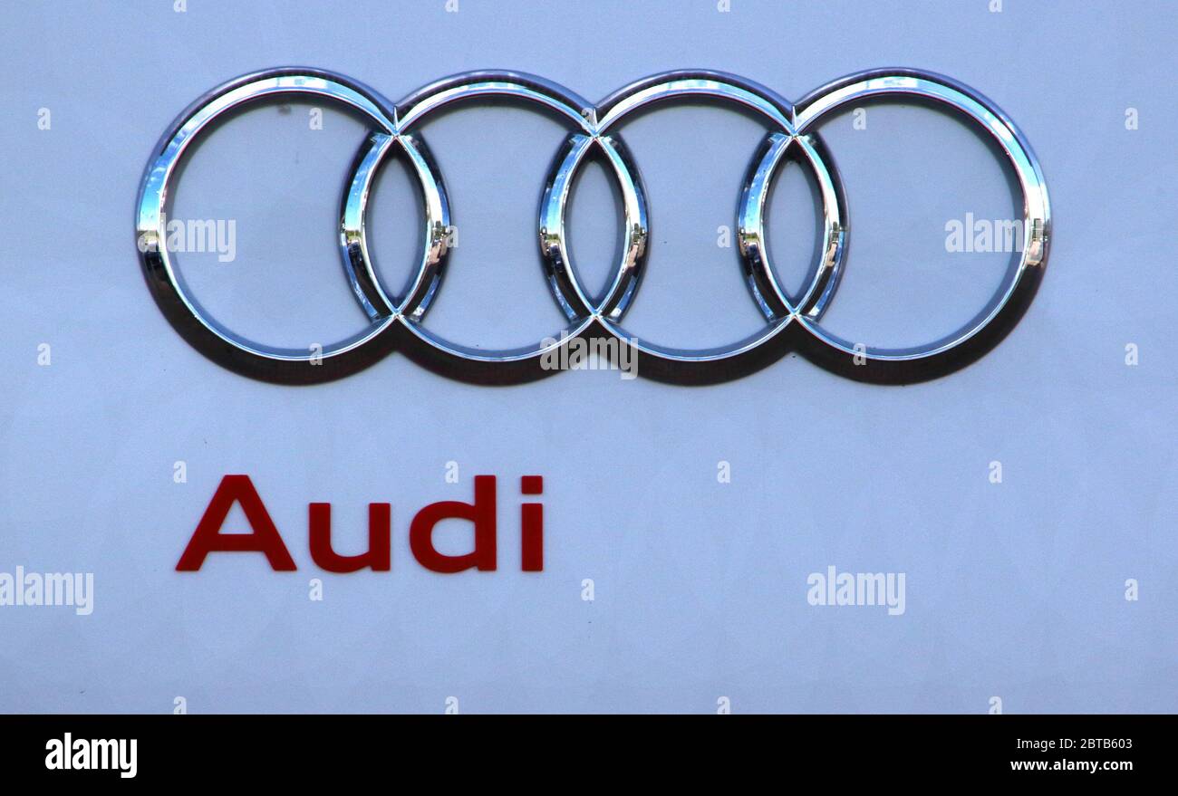 An Audi motor company logo seen at a car dealership Stock Photo - Alamy
