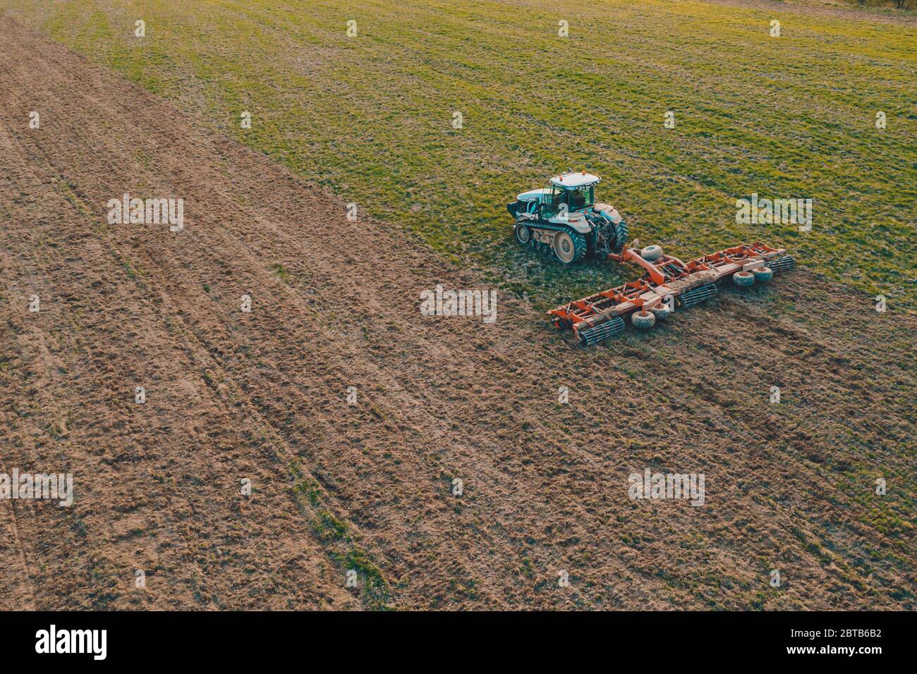 Aerial tracking shot tractor in hi-res stock photography and images - Alamy