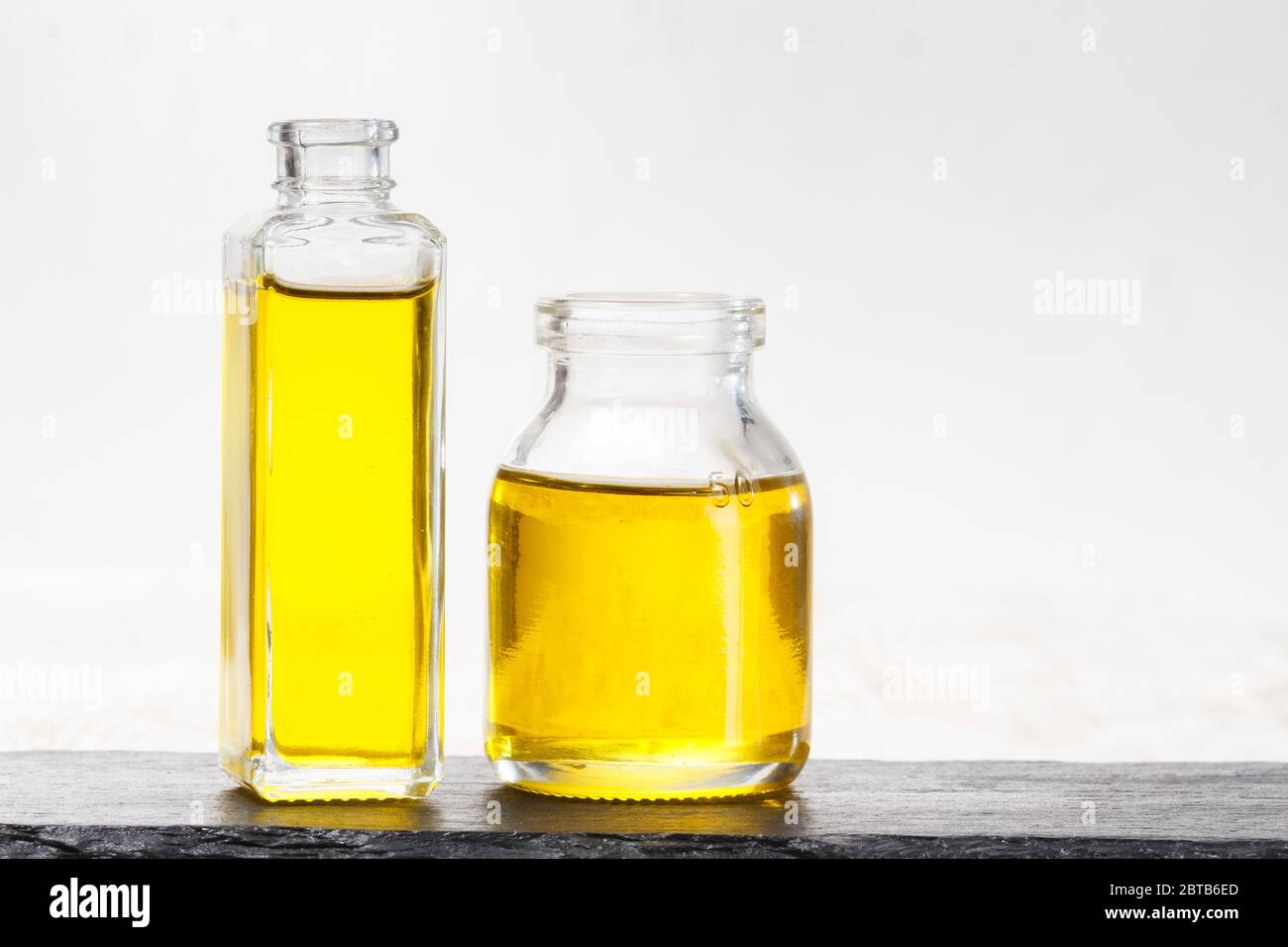 bottle with natural oil, isolated on white background, close-up Stock ...