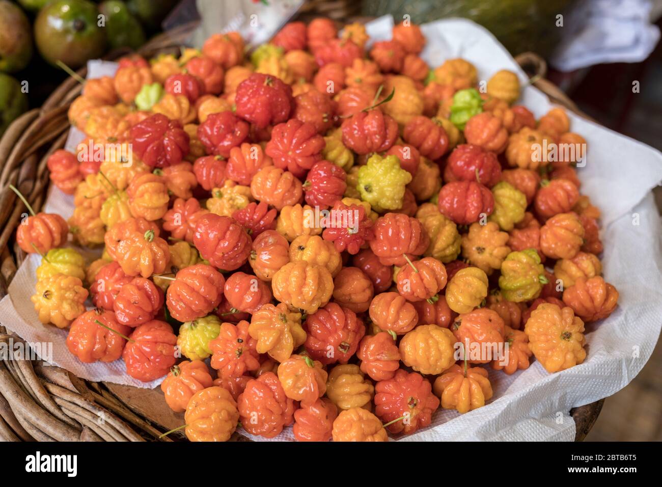 Barbados cherry fruits sale at market in Funchal on Madeira Stock Photo ...