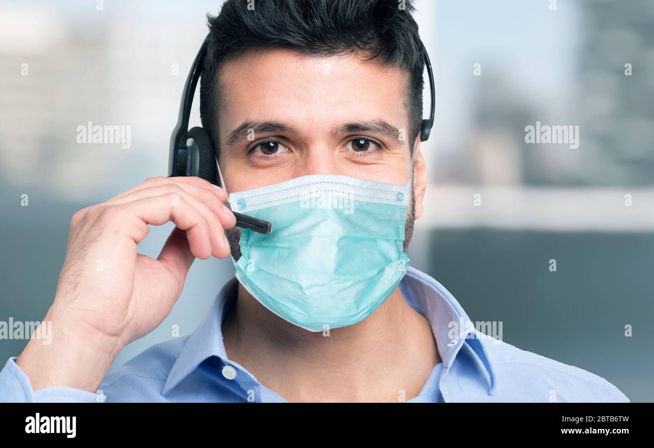 Masked man using hi-res stock photography and images - Alamy