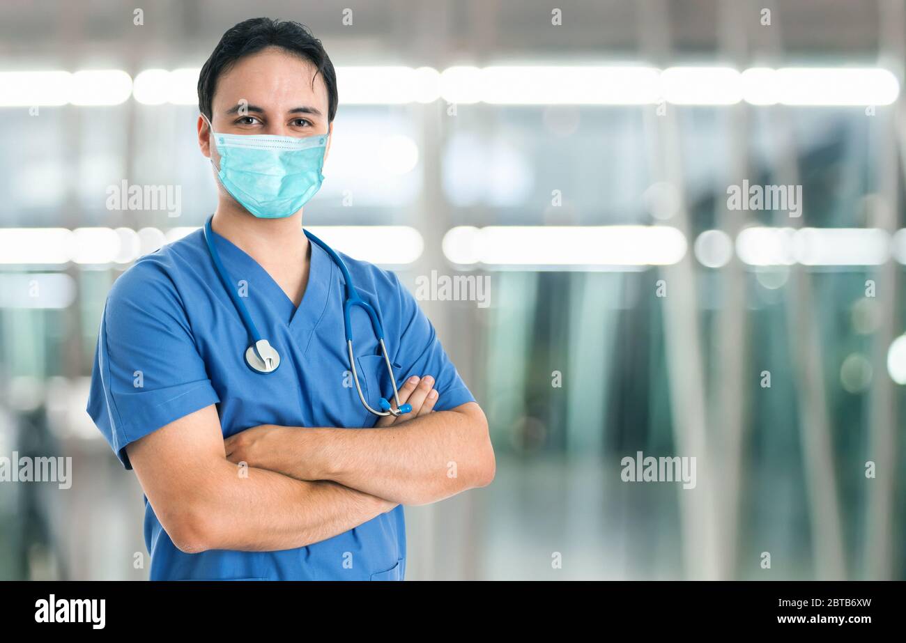 Doctor wearing a mask in hospital Stock Photo - Alamy