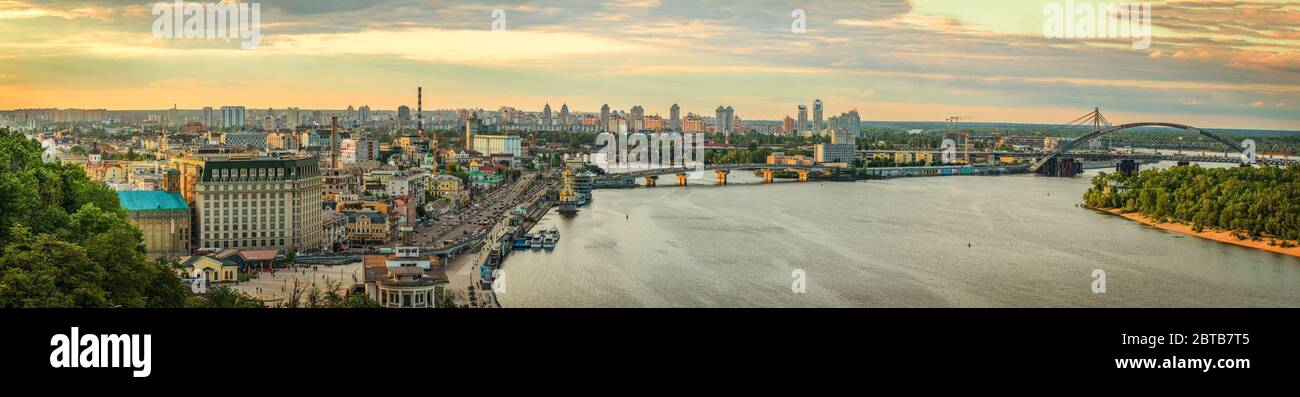 View to Podil District of Kyiv city at sunset from the Pedestrian ...