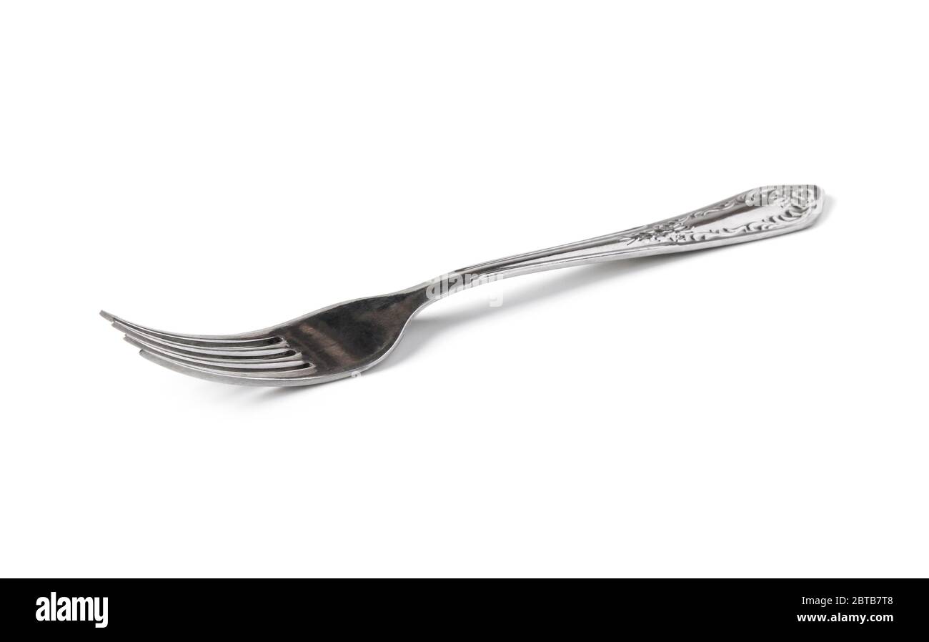 Metal fork close-up isolated on a white background Stock Photo - Alamy