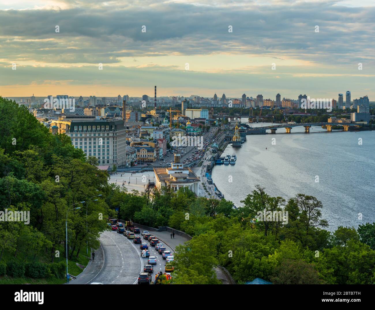View to Podil District of Kyiv city at sunset from the Pedestrian ...