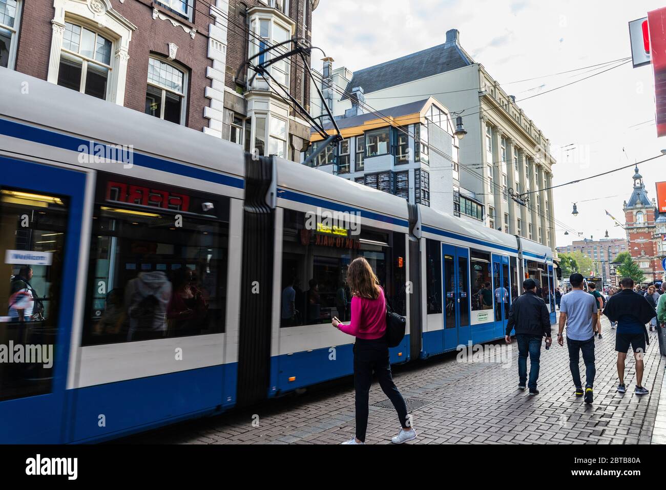 Amsterdam, Netherlands - September 9, 2018: Tram circulating and people ...