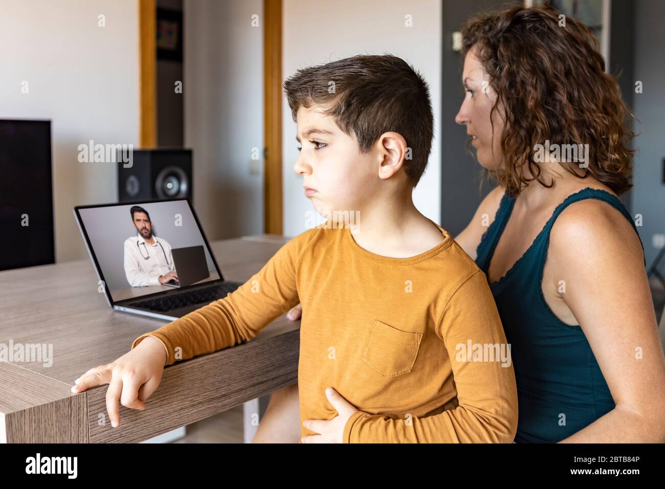 Boy woman doctor laptop hi-res stock photography and images - Alamy