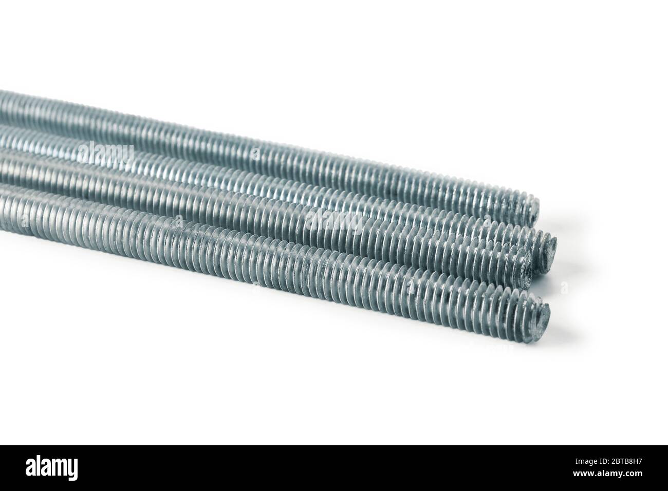 Steel threaded rods isolated on white background Stock Photo - Alamy